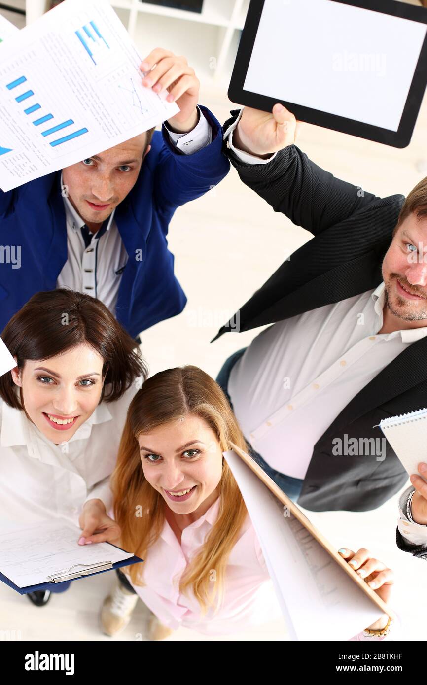 Group of joyful happy people in suits celebrate win Stock Photo - Alamy