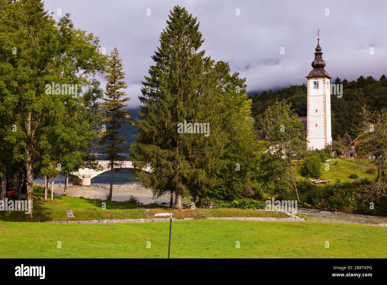 Bell tower of St John the Baptist church in Bohinj, Slovenia Stock ...