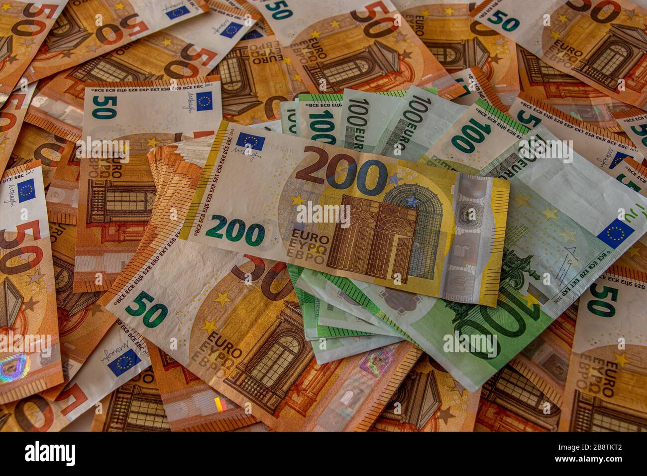 Different euro note of table Stock Photo - Alamy