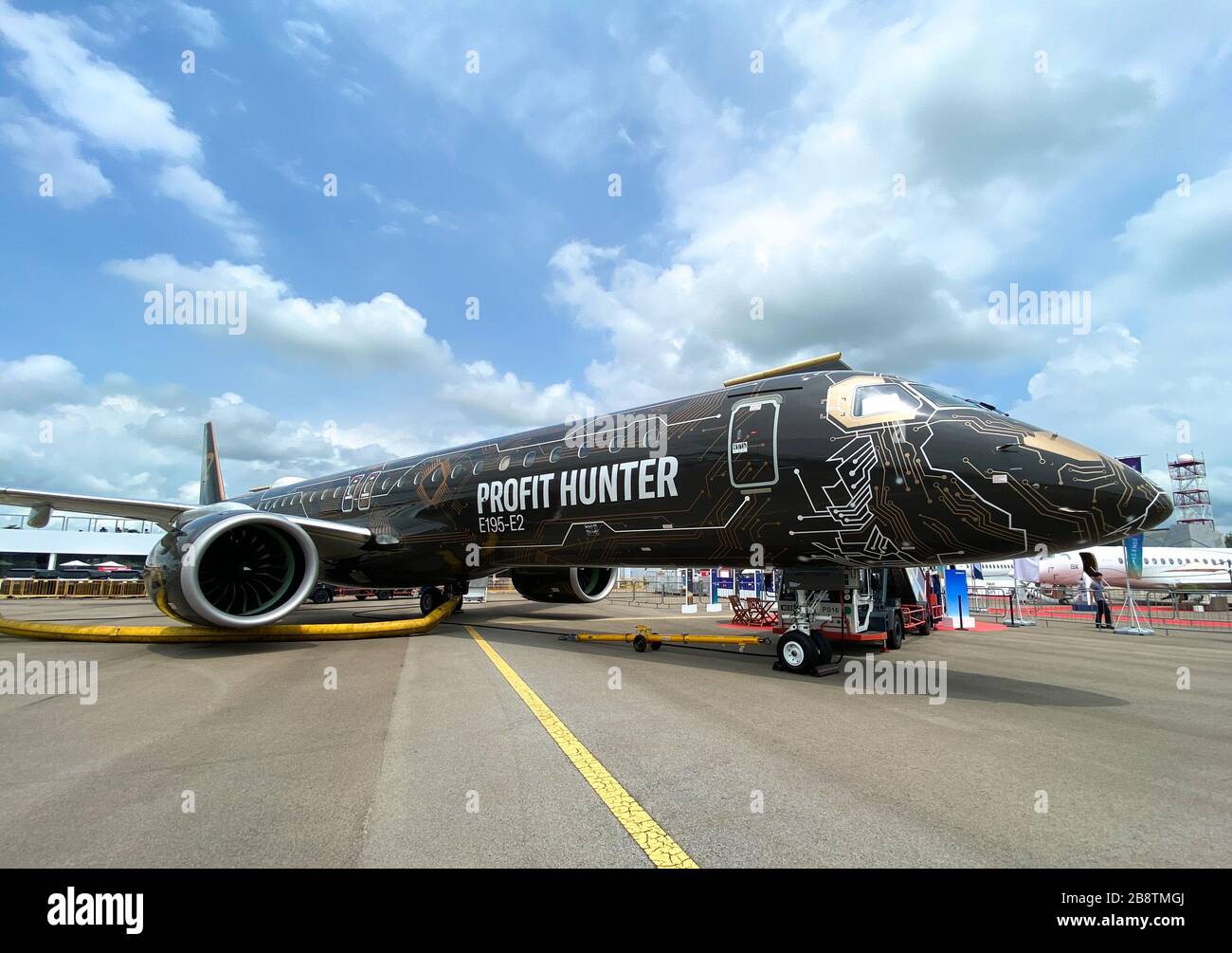 Singapore - Feb 12, 2020. Embraer E195-E2 Profit Hunter standing for ...