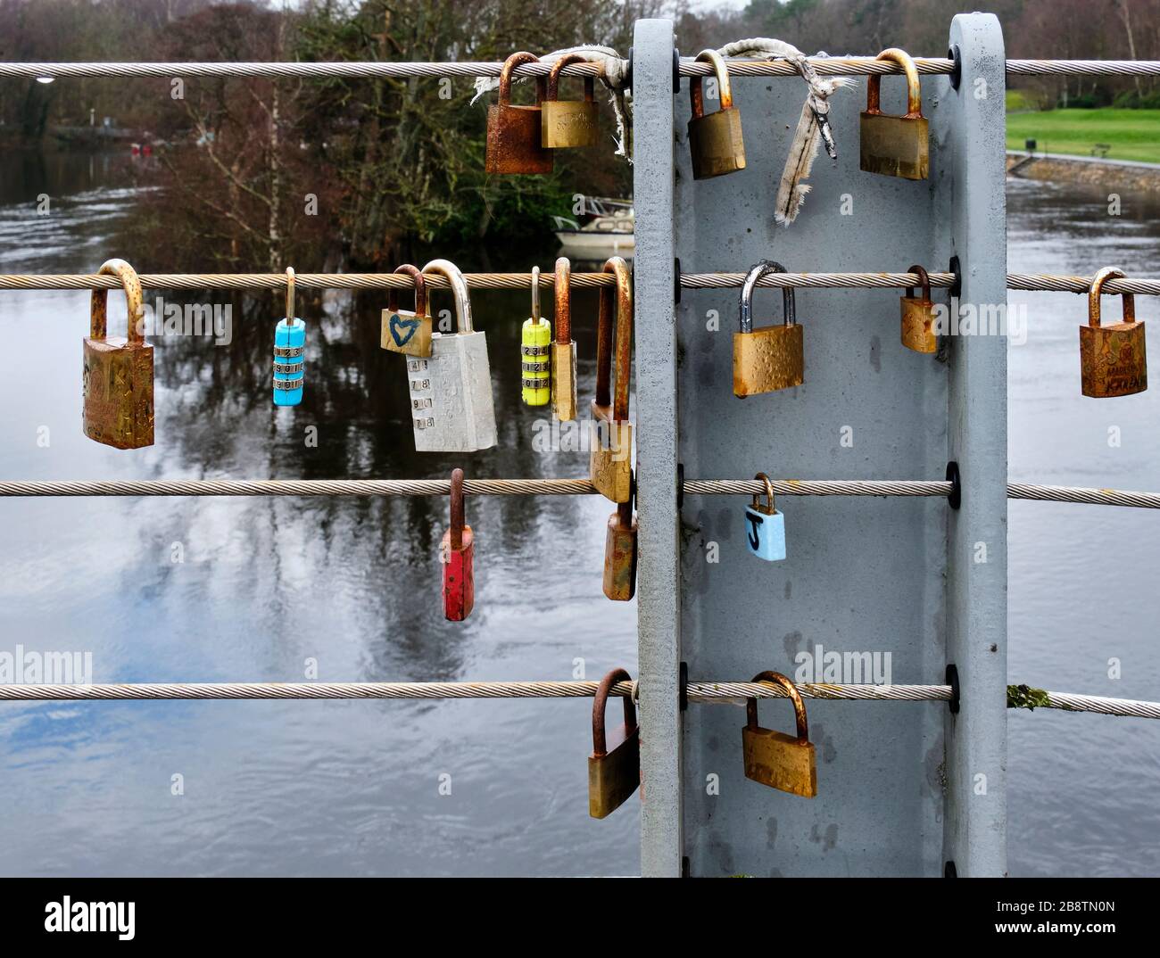 Padlocks (love locks) on the Balloch Road bridge, Balloch, Loch Lomond ...