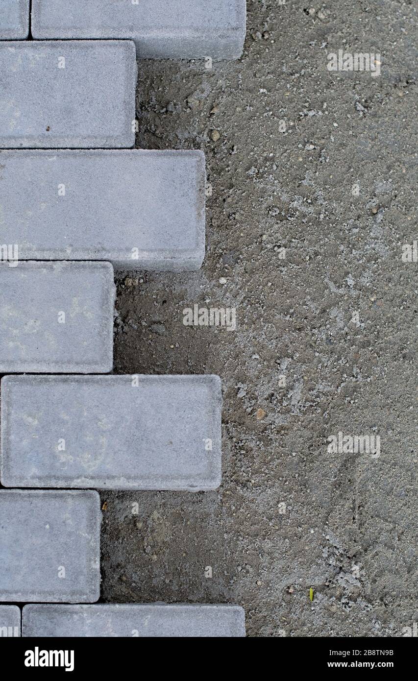 Paving stones paving background. A close up Stock Photo - Alamy