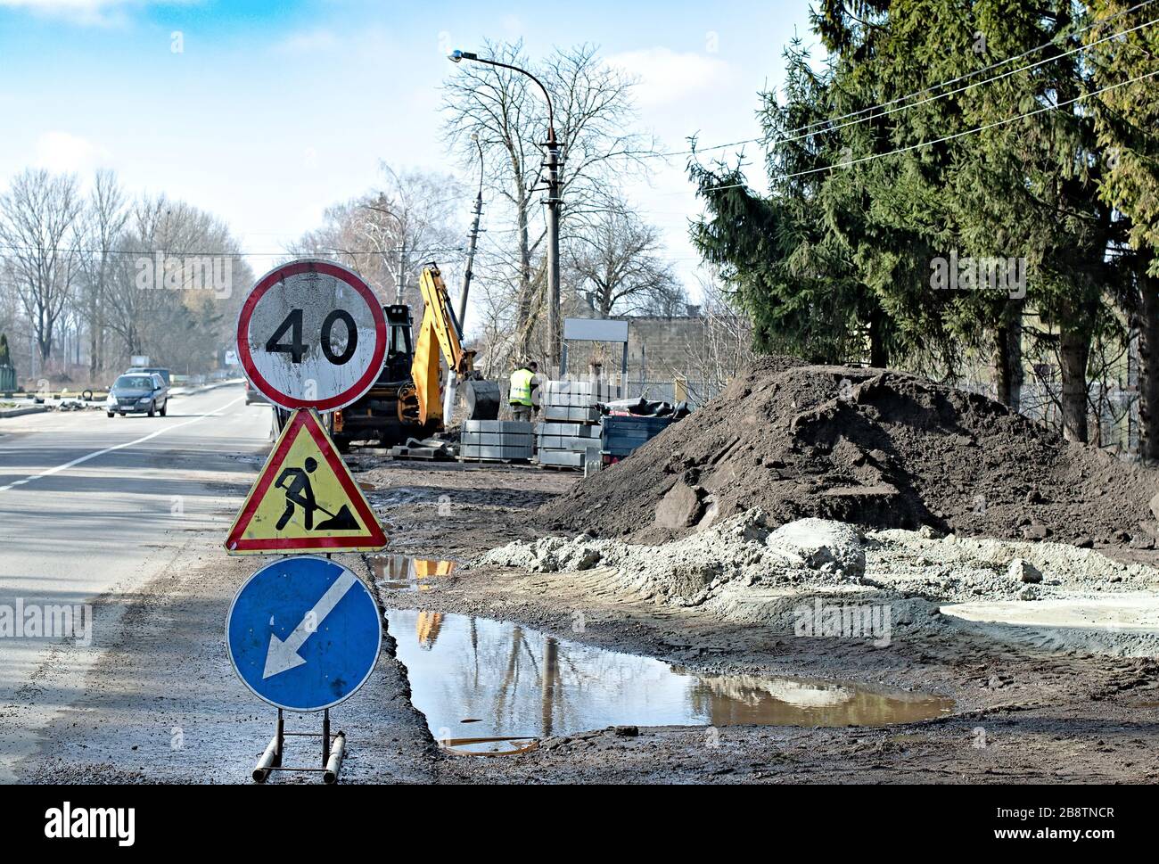 Road works. Traffic signs. Roadwork sign and keep left sign Stock Photo ...