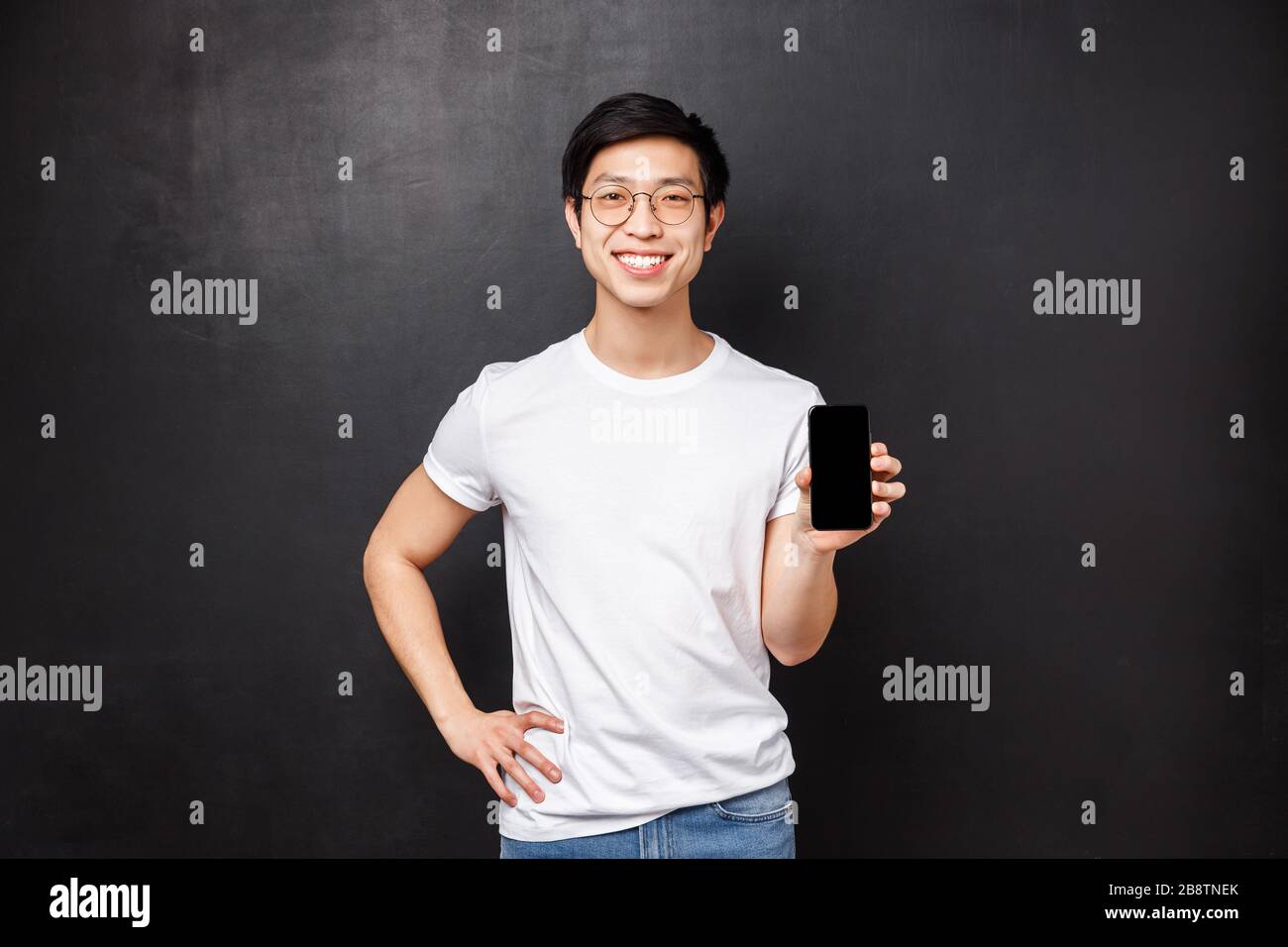 Technology, gadgets and people concept. Portrait of young male store ...