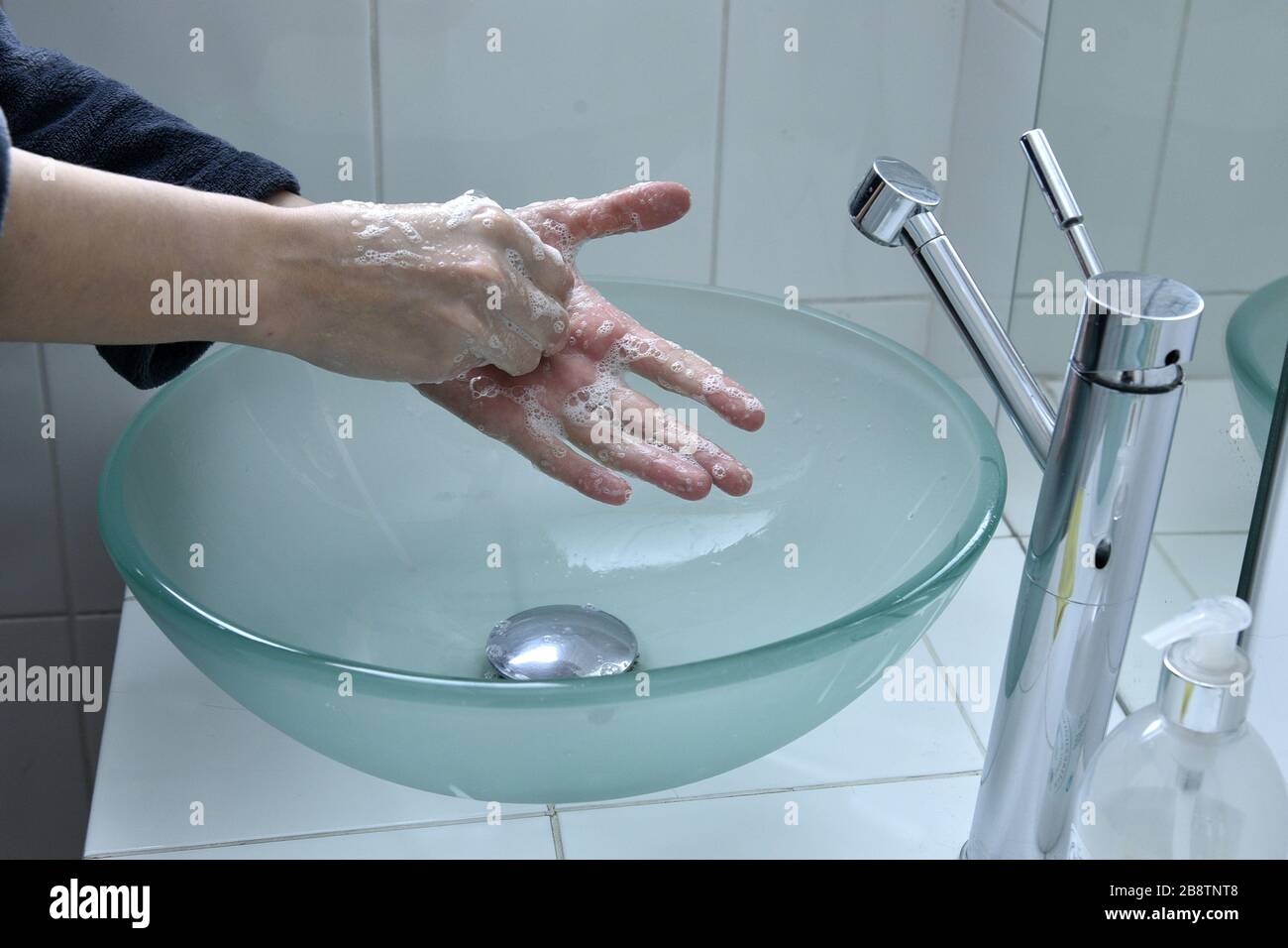Protecting hands with wash hi-res stock photography and images - Alamy