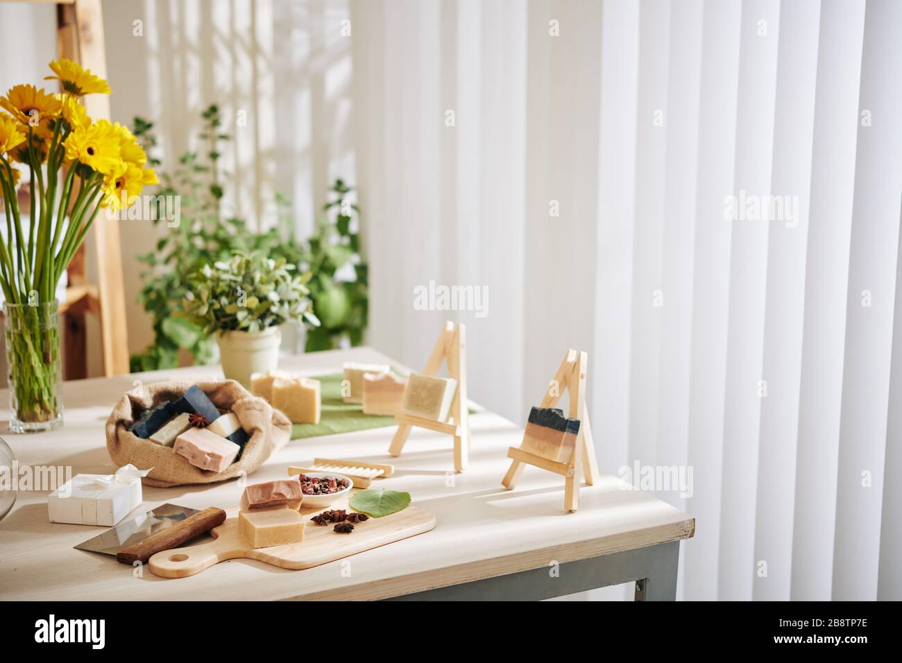 Workshop table with various handmade soap bars prepared for sale Stock ...