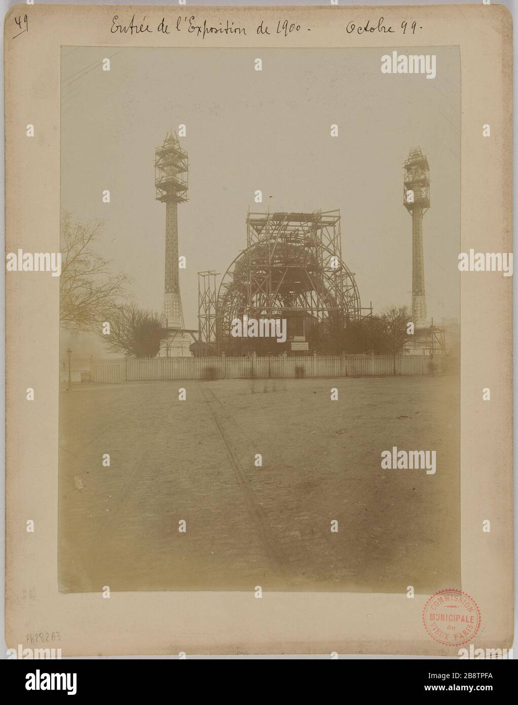 1900. Exposure Entry October 99. Construction of the monumental gate of ...