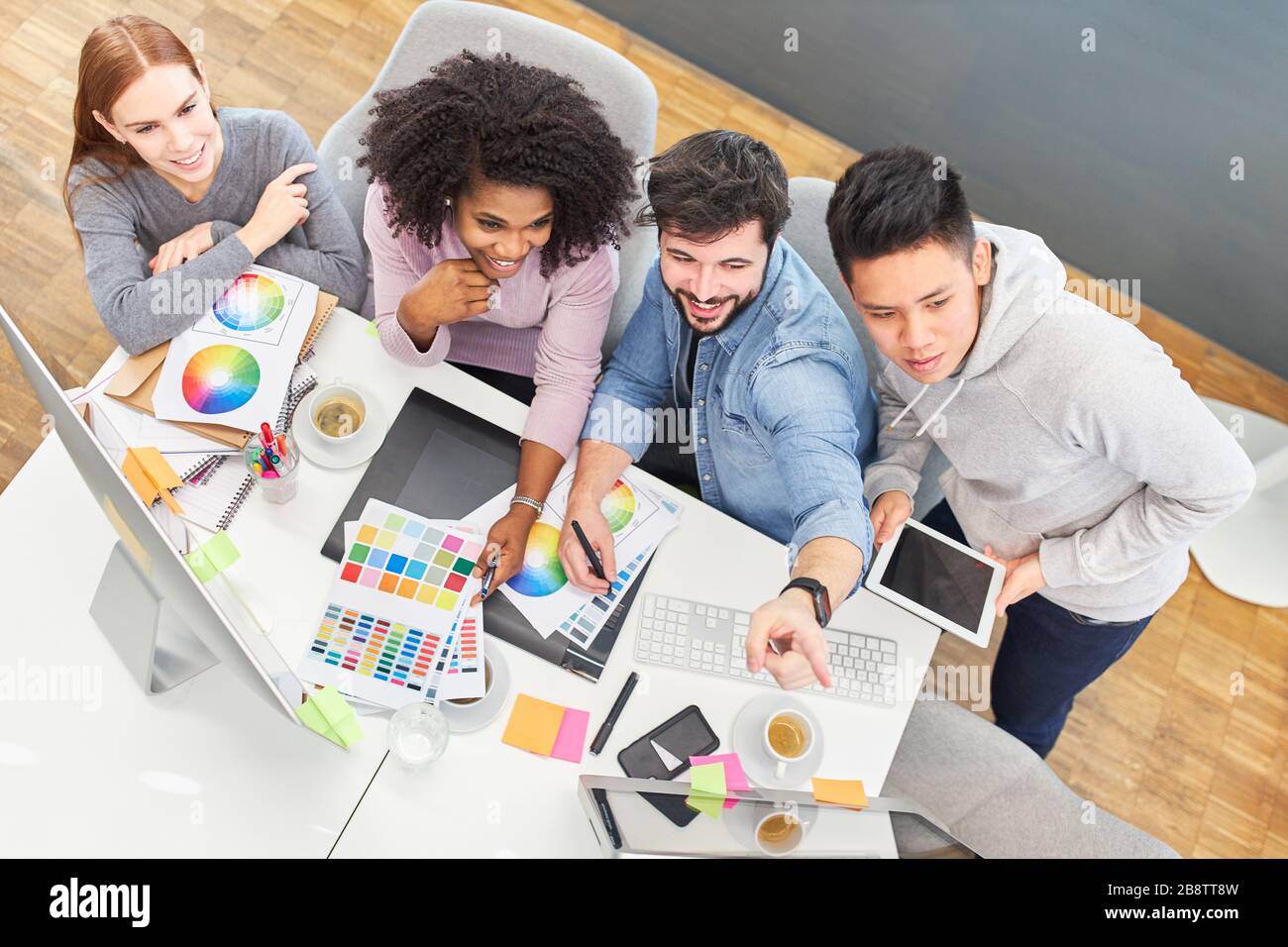 Creative graphic design team has an idea for the color design of a ...