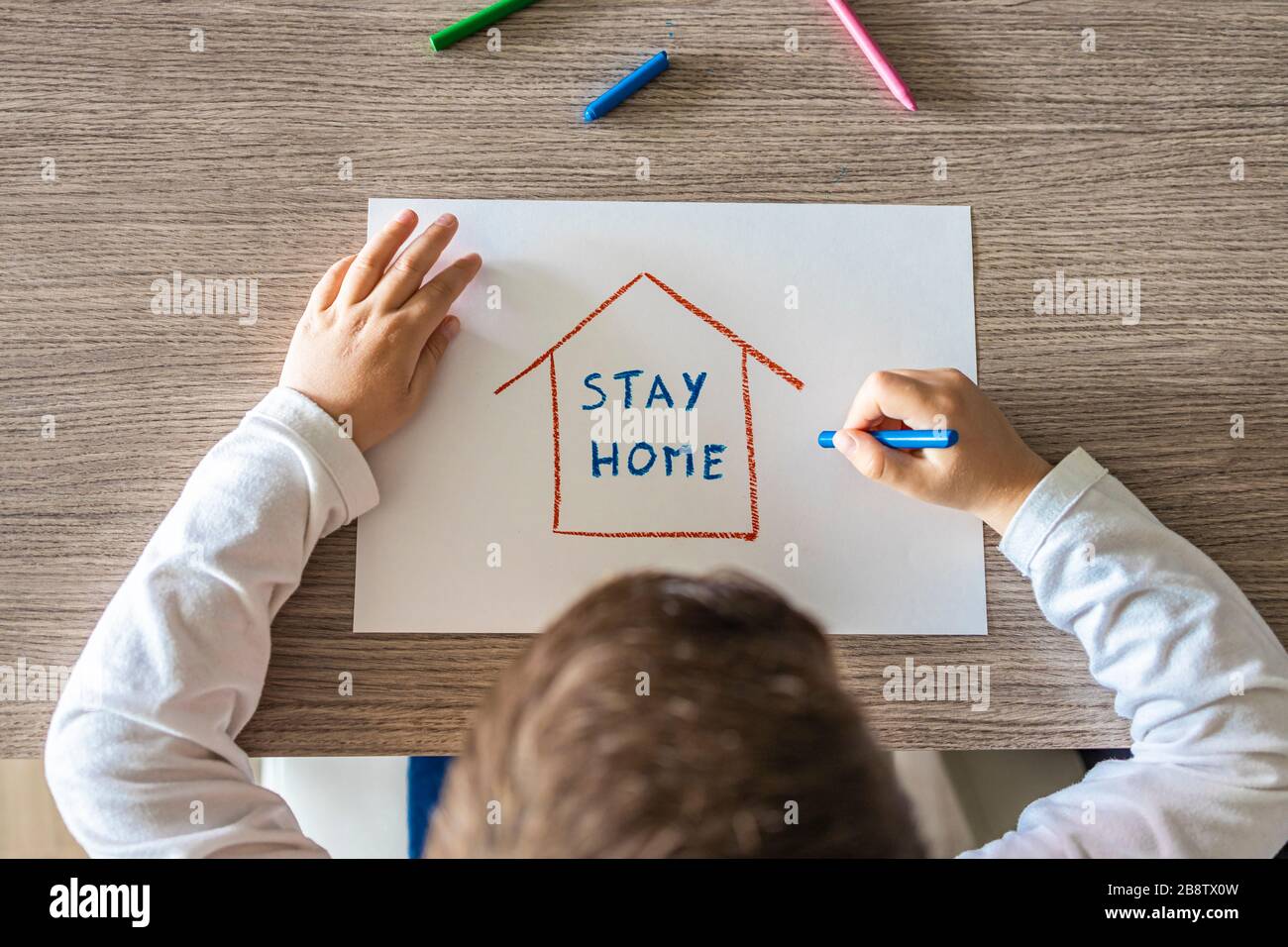 Little kid with Stay Home draw. Coronavirus concept Stock Photo - Alamy