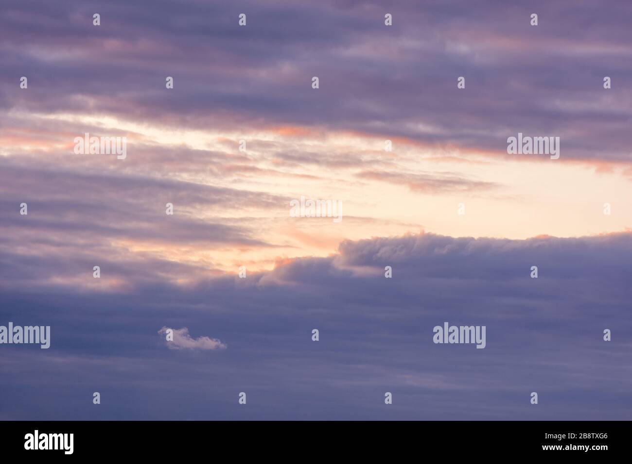 texture of a colorful sky with clouds and sun Stock Photo - Alamy