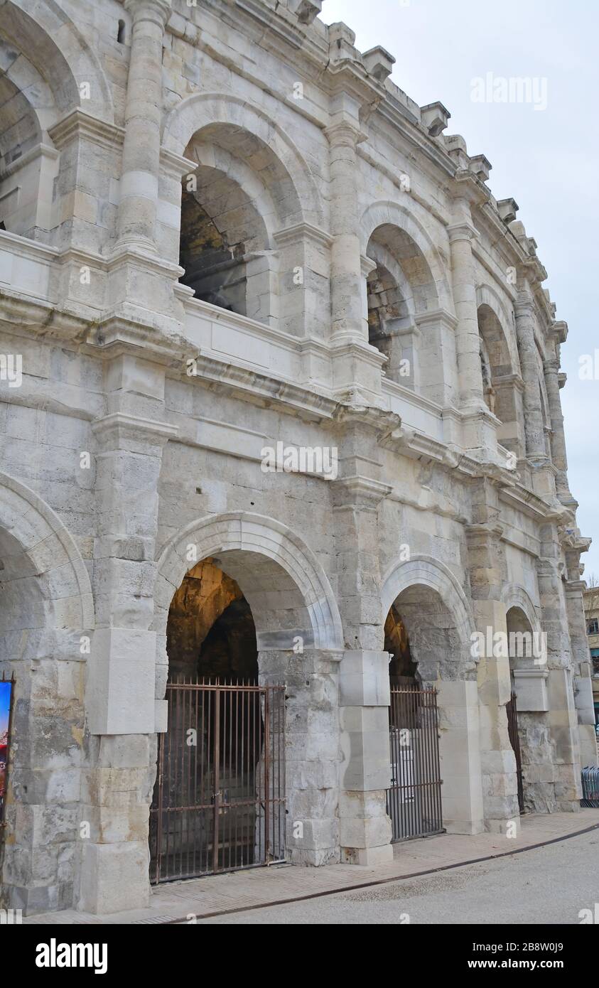 The outer wall of the Ancient Roman Amphitheatre at Nimes in the South ...