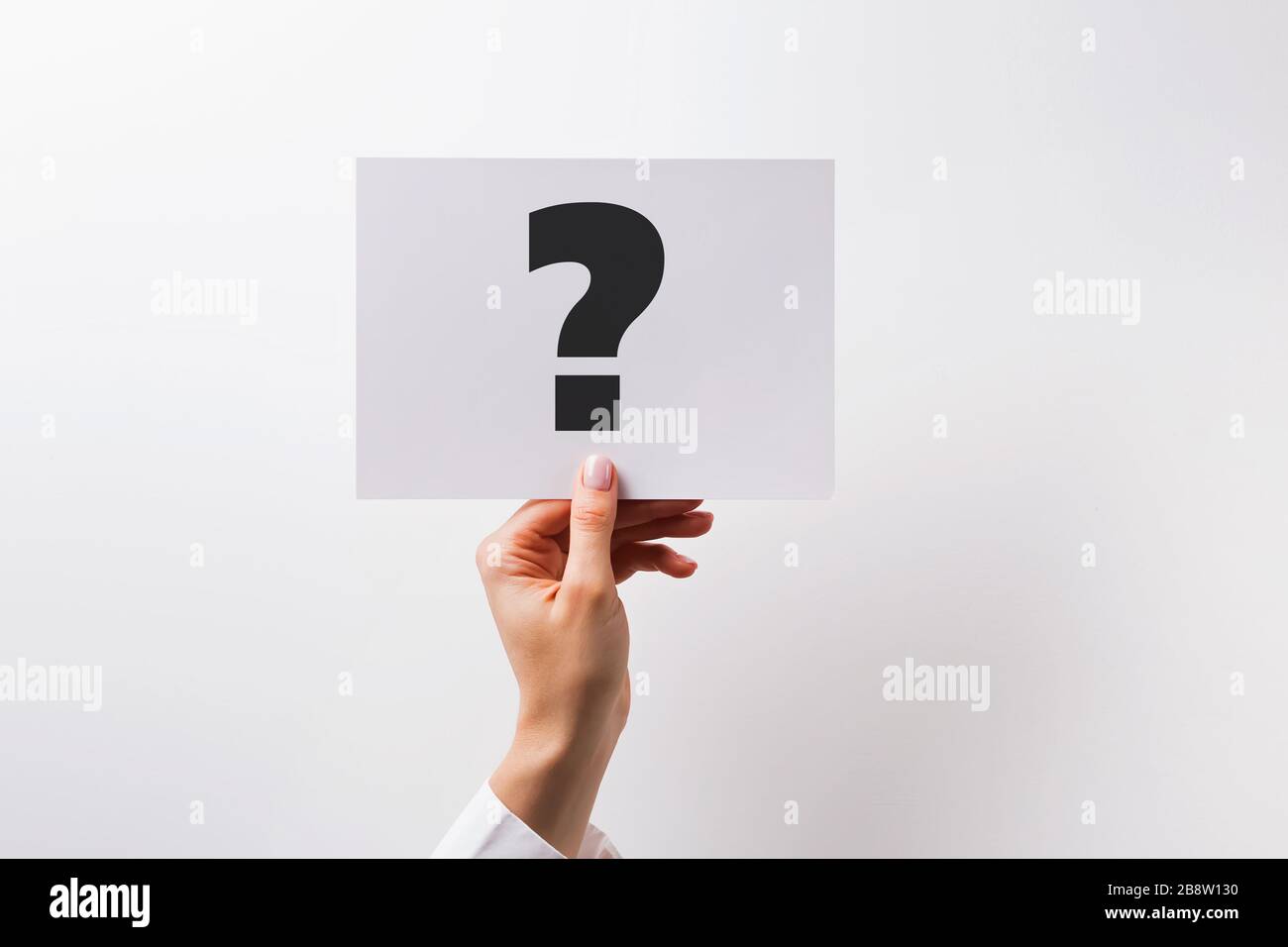 Hands holding sign question mark hi-res stock photography and images ...