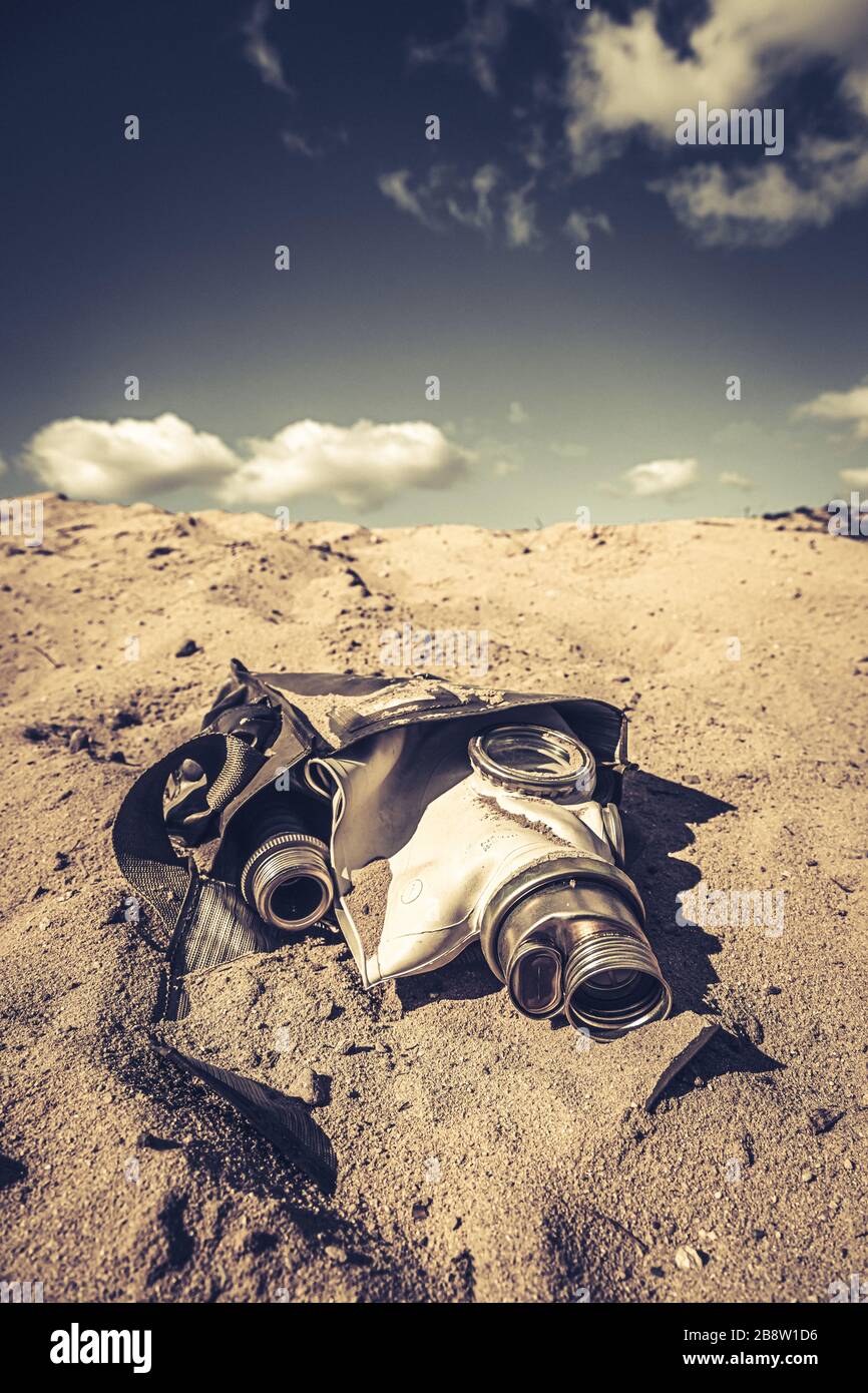Contaminated gas mask in a polluted area by industry Stock Photo - Alamy