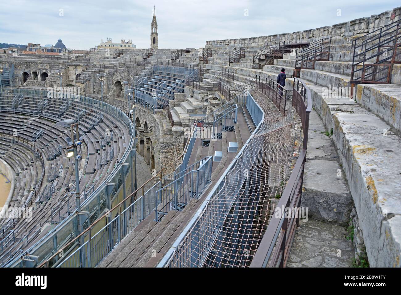 Rows of seats in an ancient Roman Amphitheatre at Nimes in the South of ...