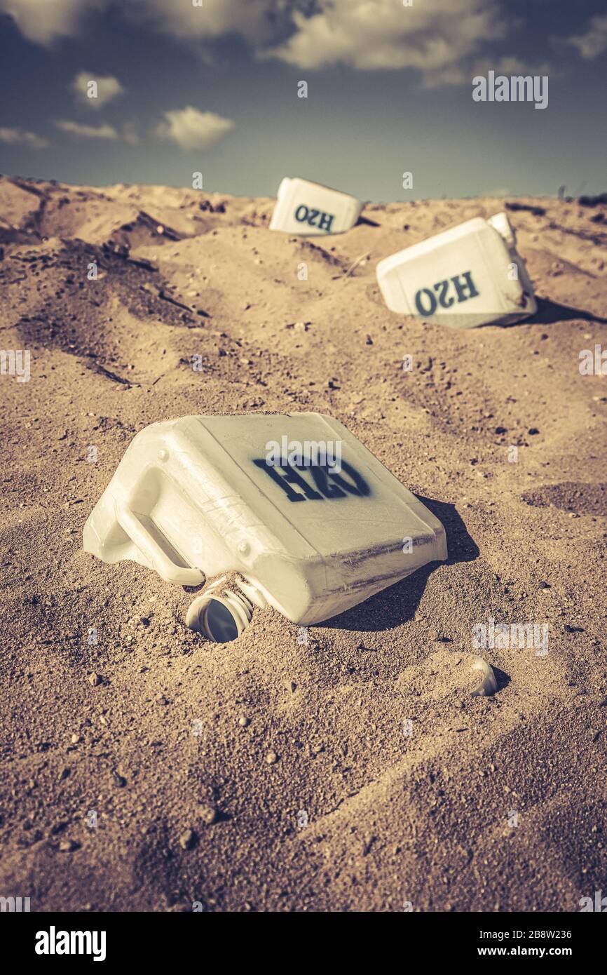 Contaminated water cans in a polluted area by industry Stock Photo - Alamy