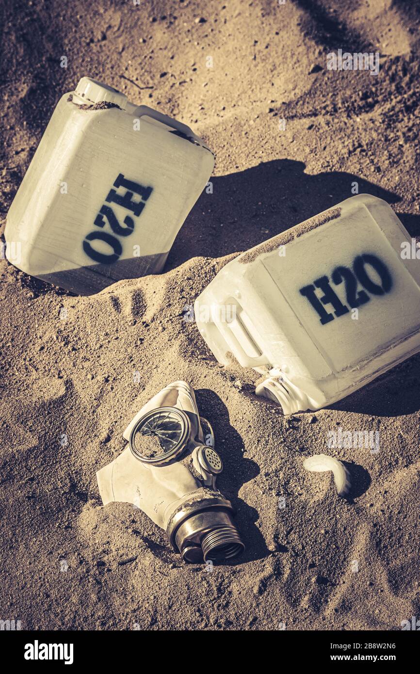 Unclean water cans as a industry pollution symbol Stock Photo - Alamy