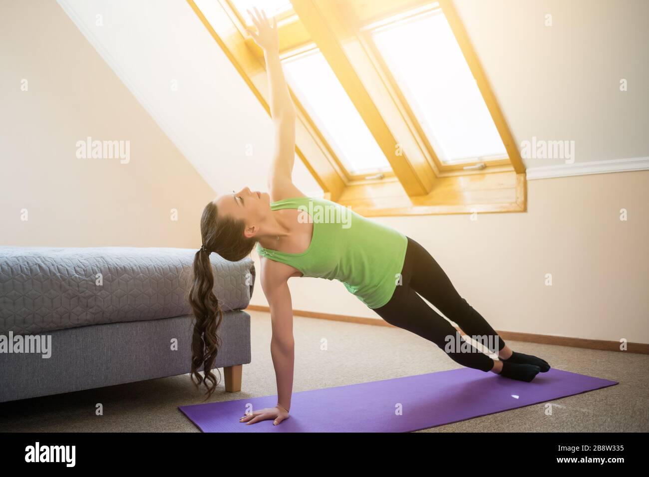 Trikonasana triangle pose hi-res stock photography and images - Alamy