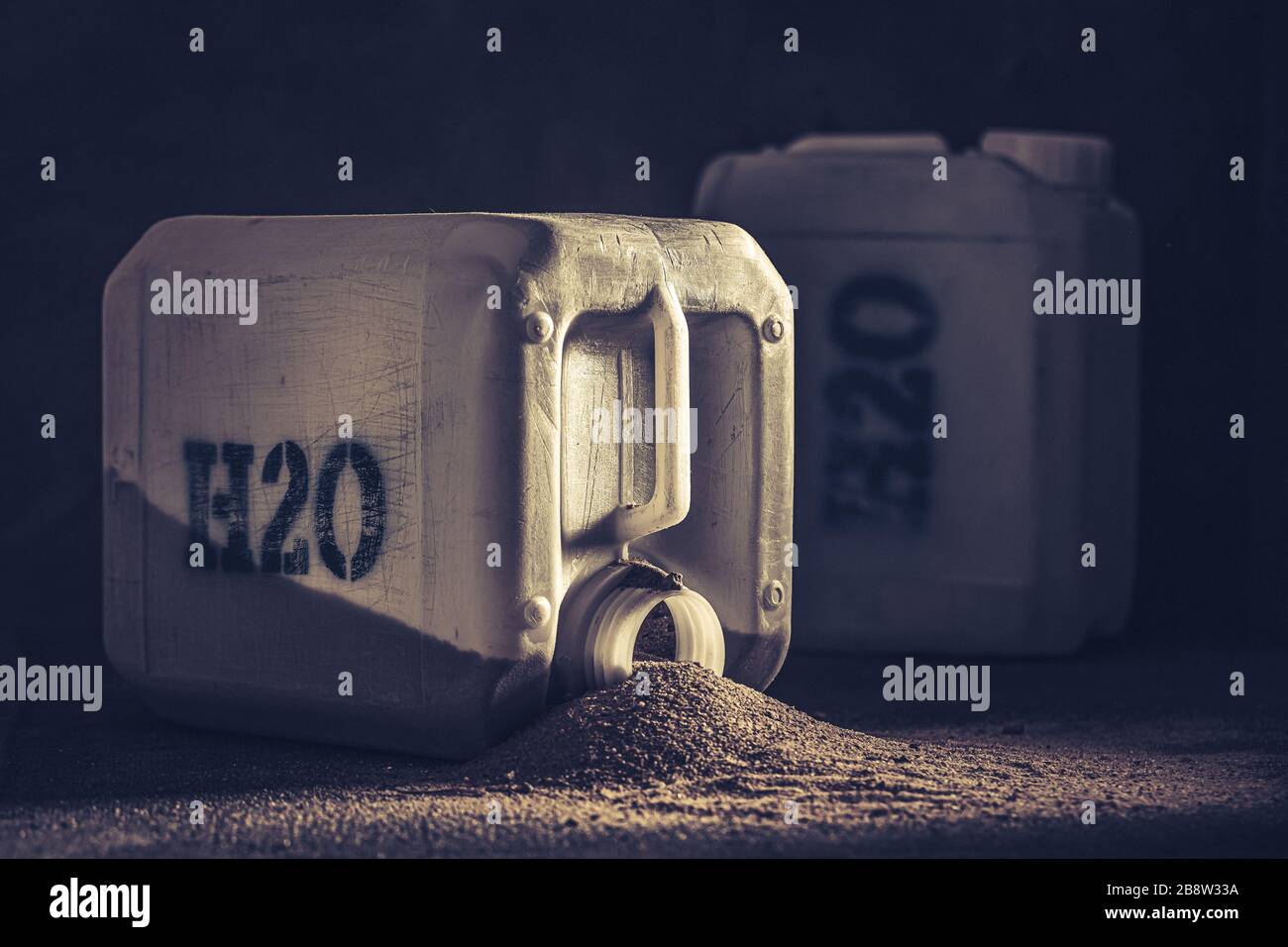 Water tank filled with sand as symbol of global warming Stock Photo - Alamy