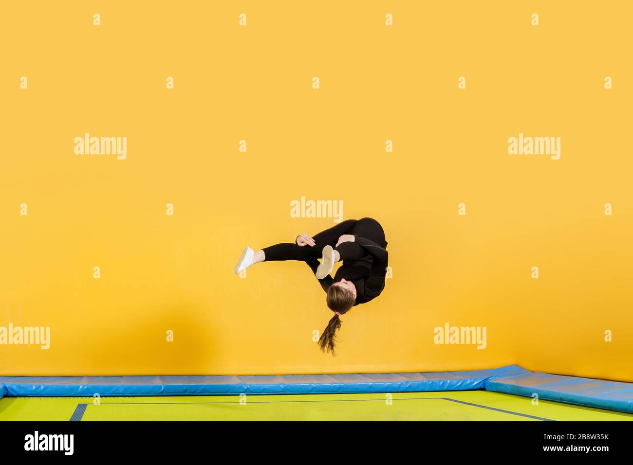 Trampoline woman acrobat hi-res stock photography and images - Alamy