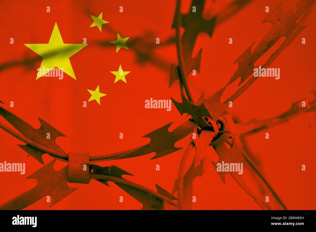 Abstract image of the national flag of China with twisted barbed wire ...