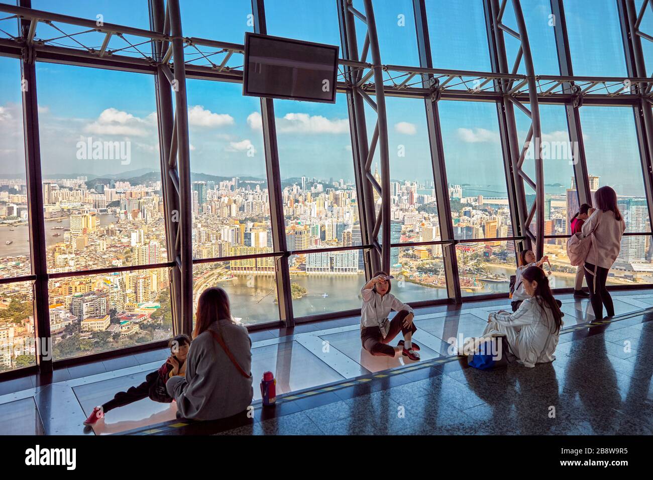 People enjoying the view of the Macau Peninsula from the Macau Tower ...