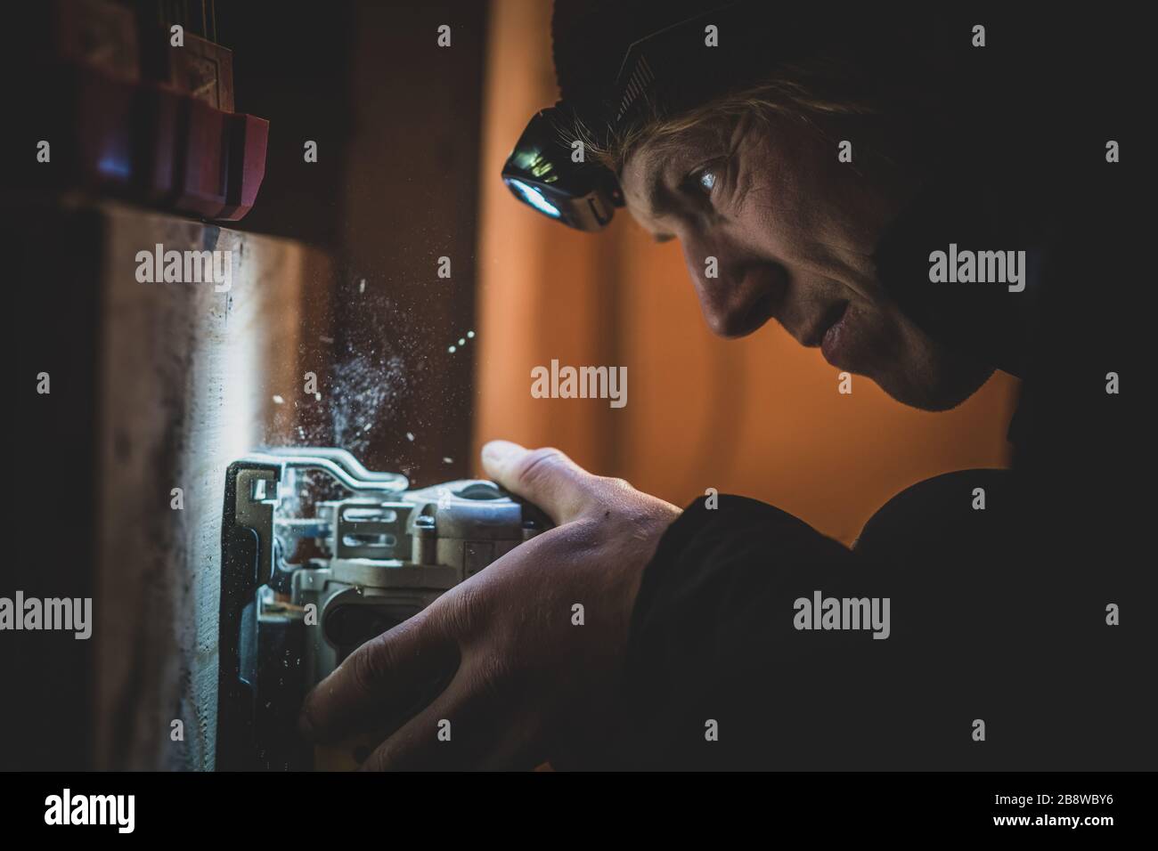 Man wearing headlamp hi-res stock photography and images - Alamy