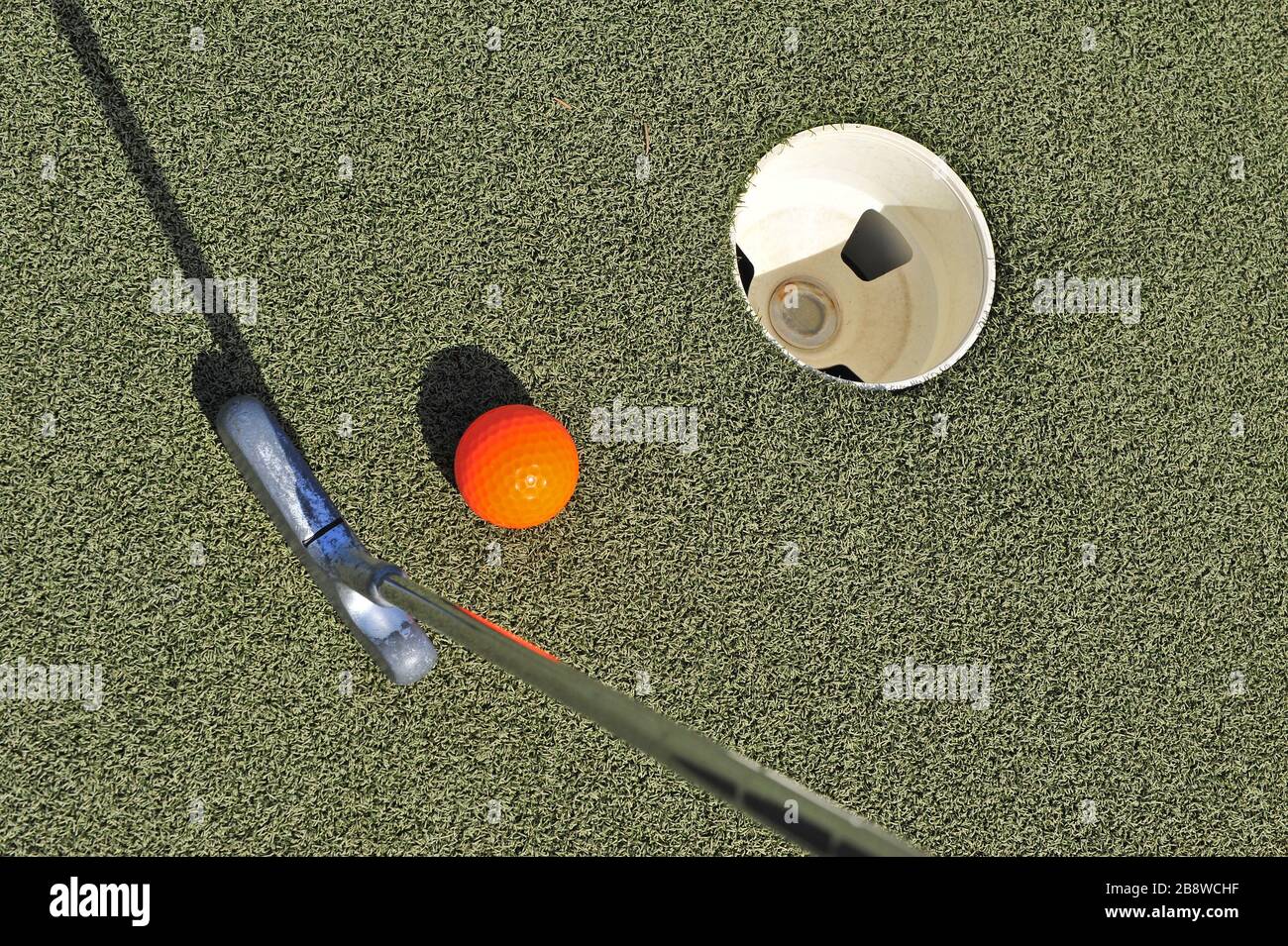 Top view of mini golf equipment: stick, ball and green court Stock ...