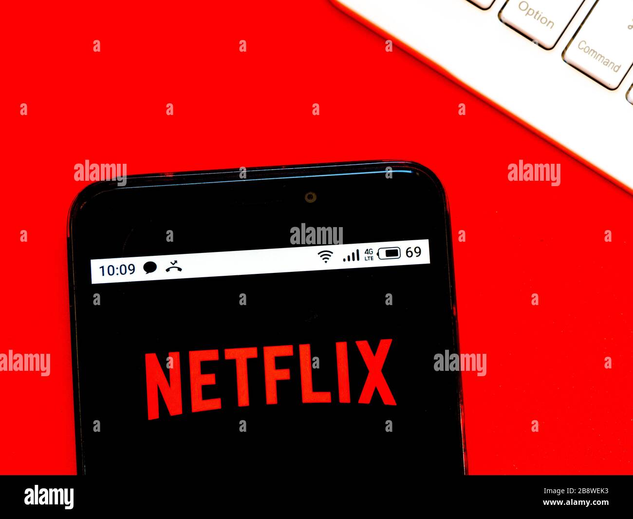 In this photo illustration a Netflix logo seen displayed on a ...
