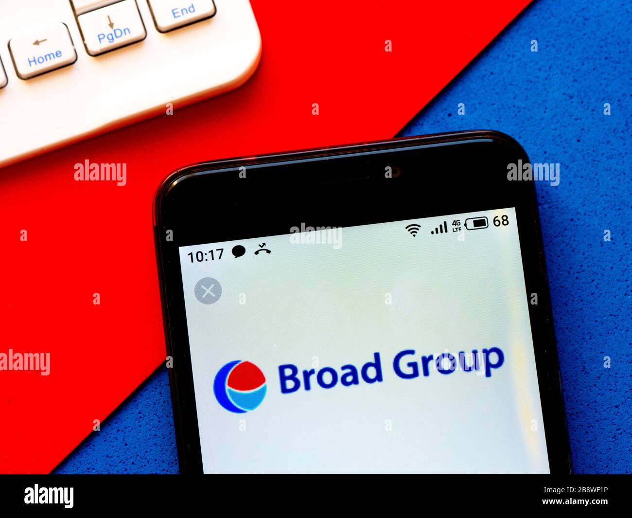 In this photo illustration a Broad Group logo seen displayed on a ...