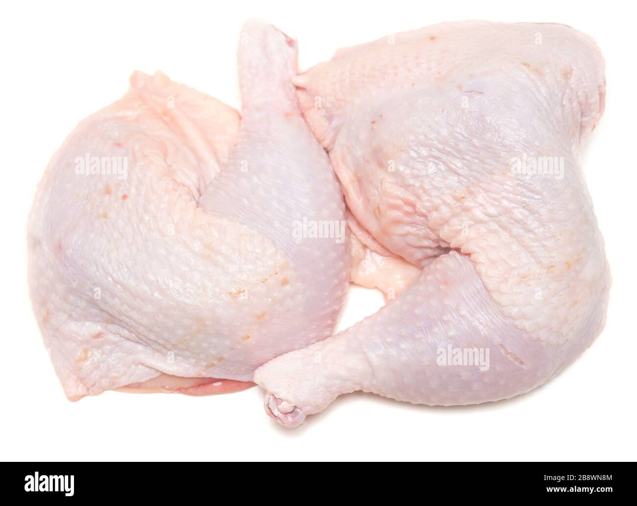 Two chicken legs isolated on white background Stock Photo - Alamy
