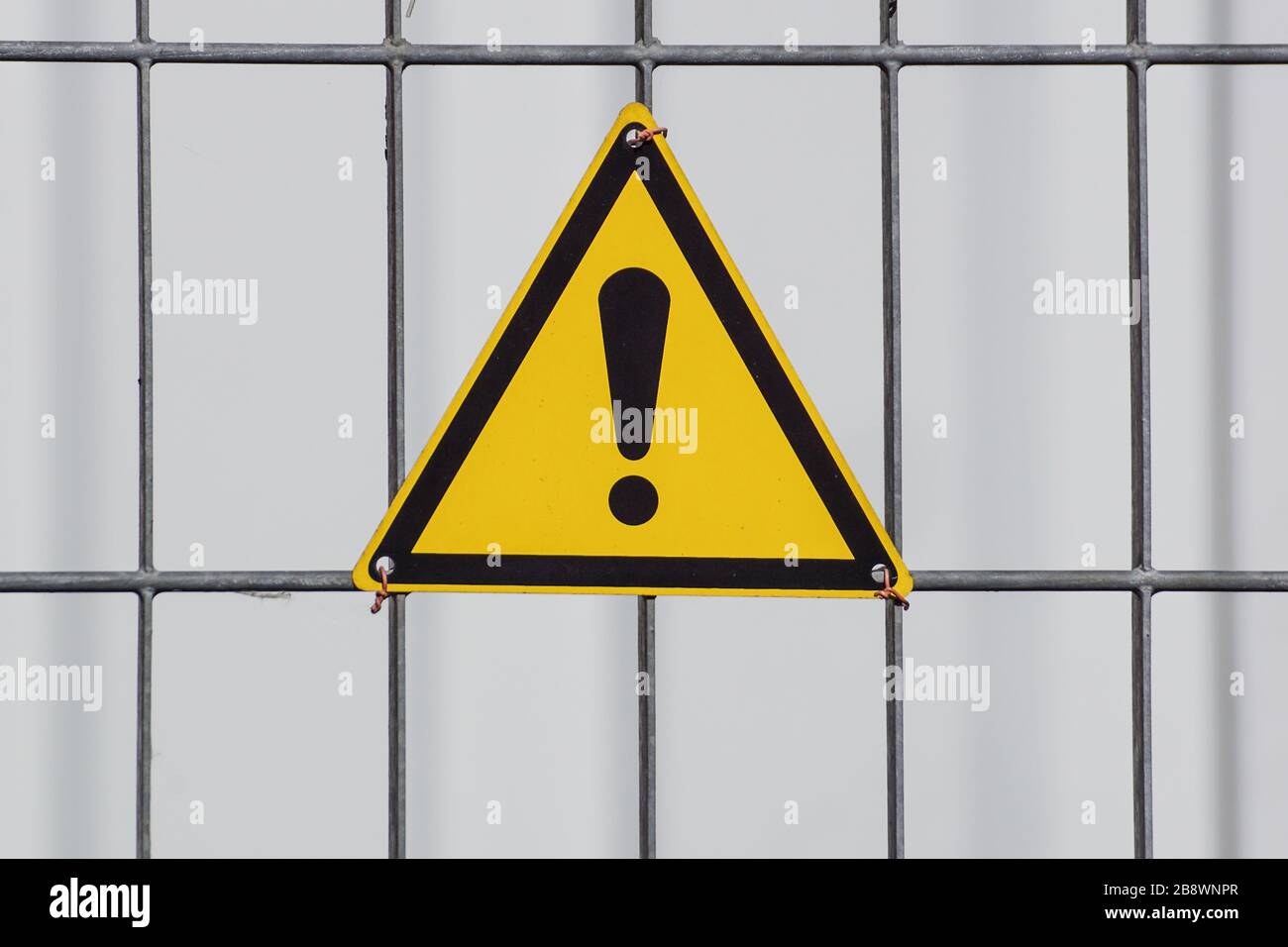 Yellow triangle warning sign hi-res stock photography and images - Alamy