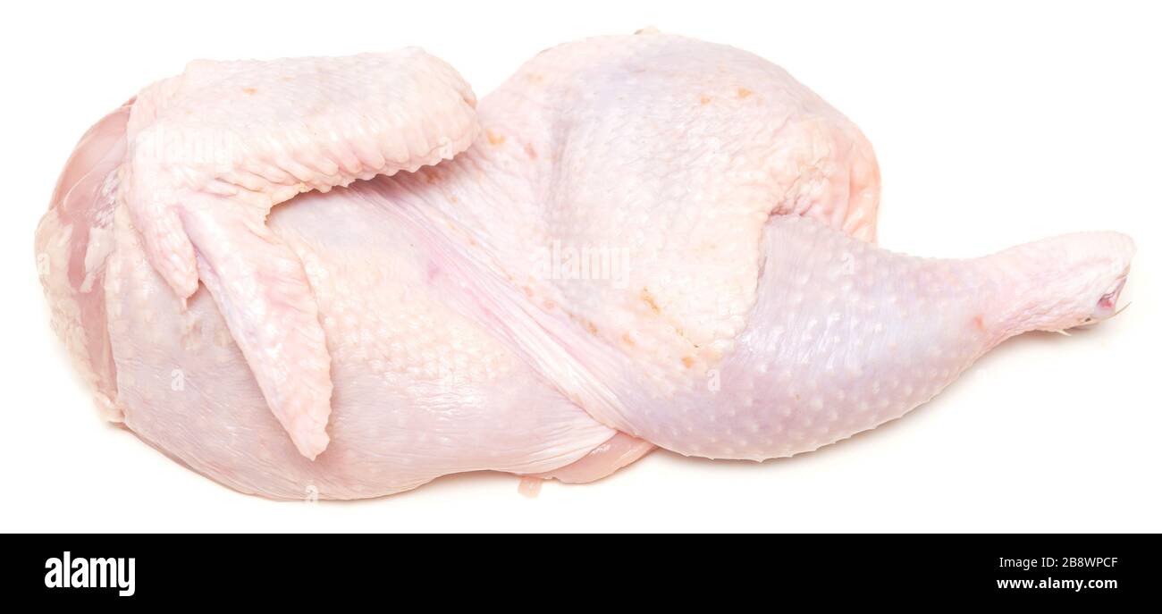 Half of raw chicken isolated on white background Stock Photo - Alamy