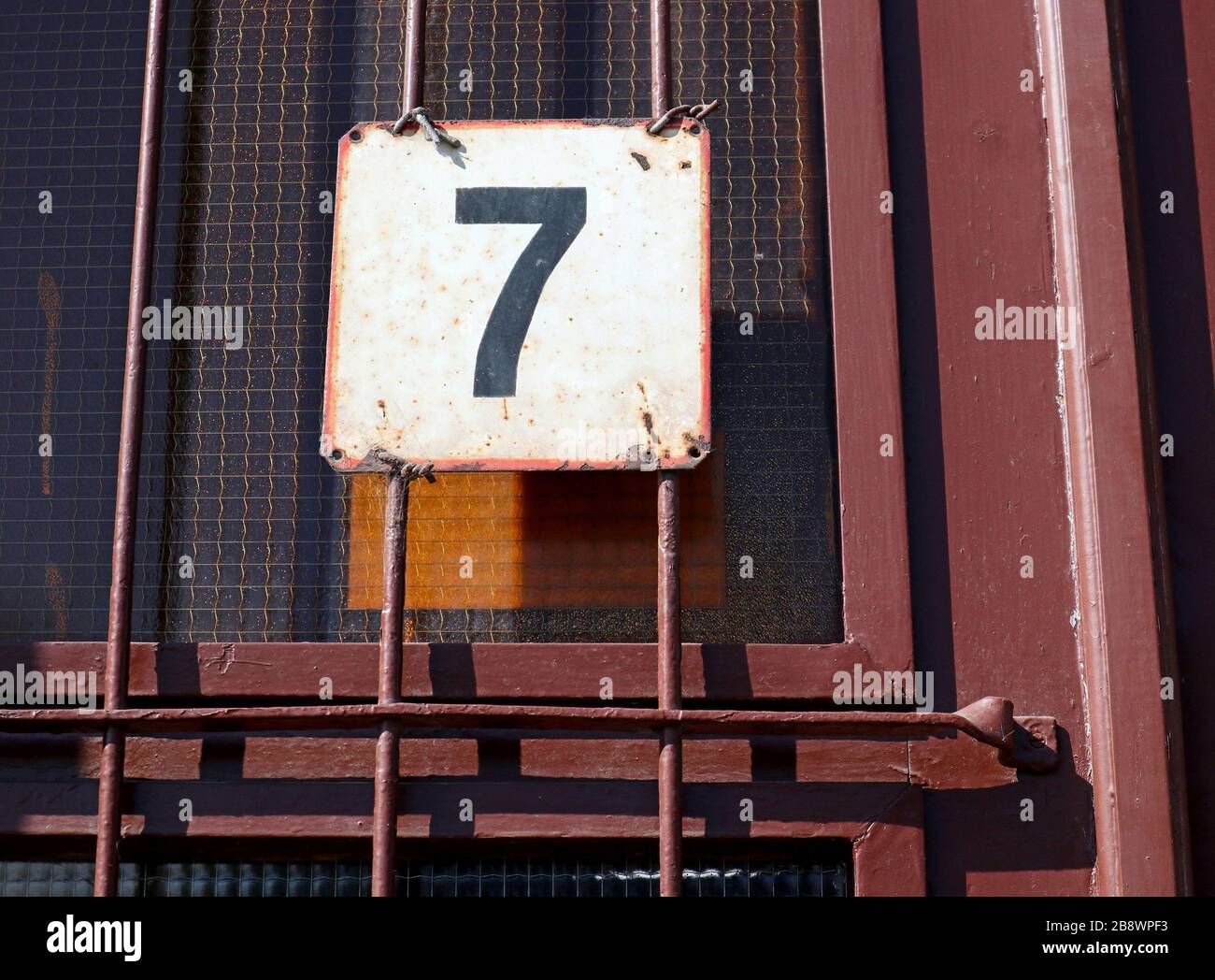 Number 7 on the door of a building Stock Photo - Alamy