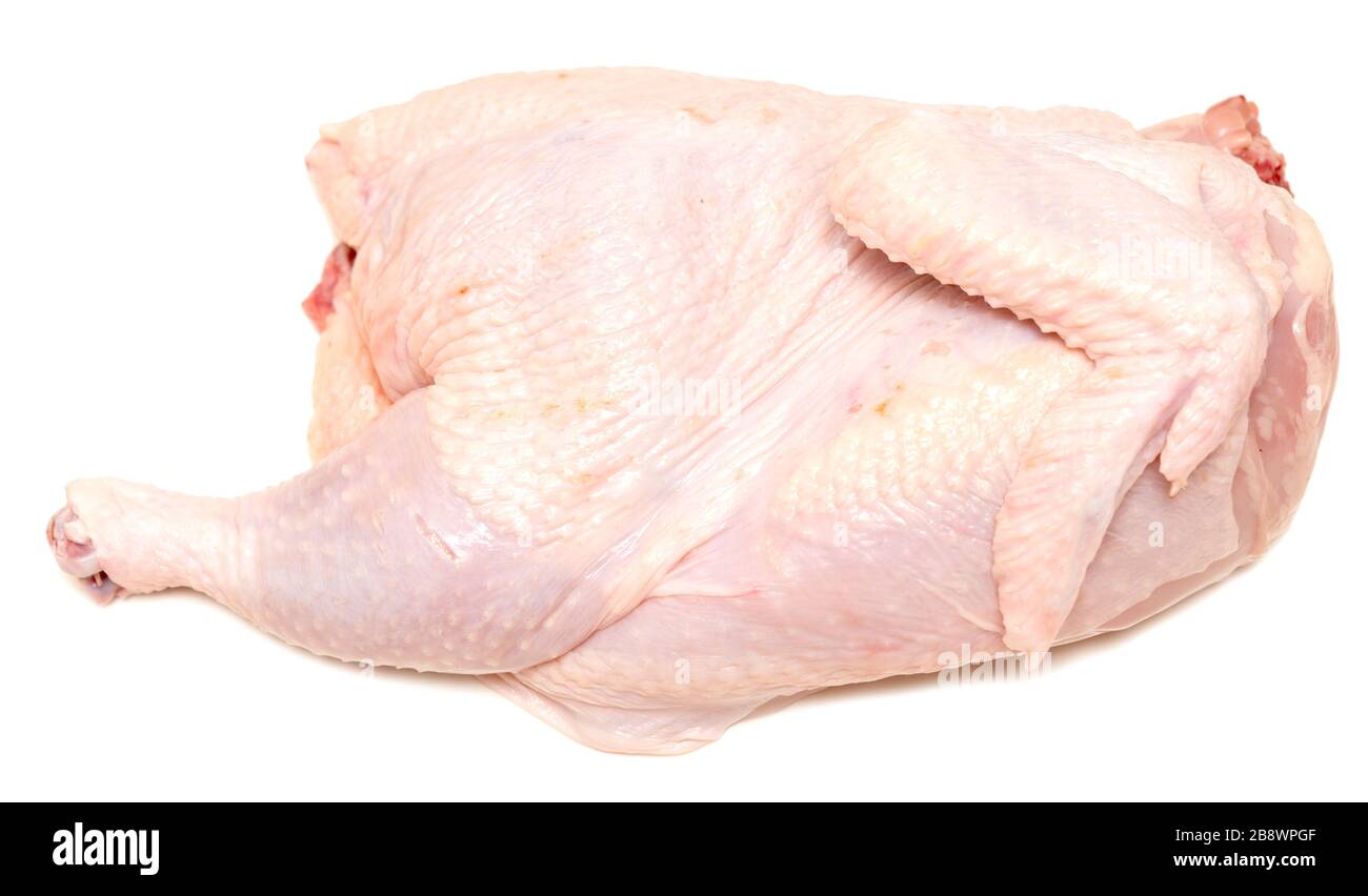 Half of raw chicken isolated on white background Stock Photo - Alamy