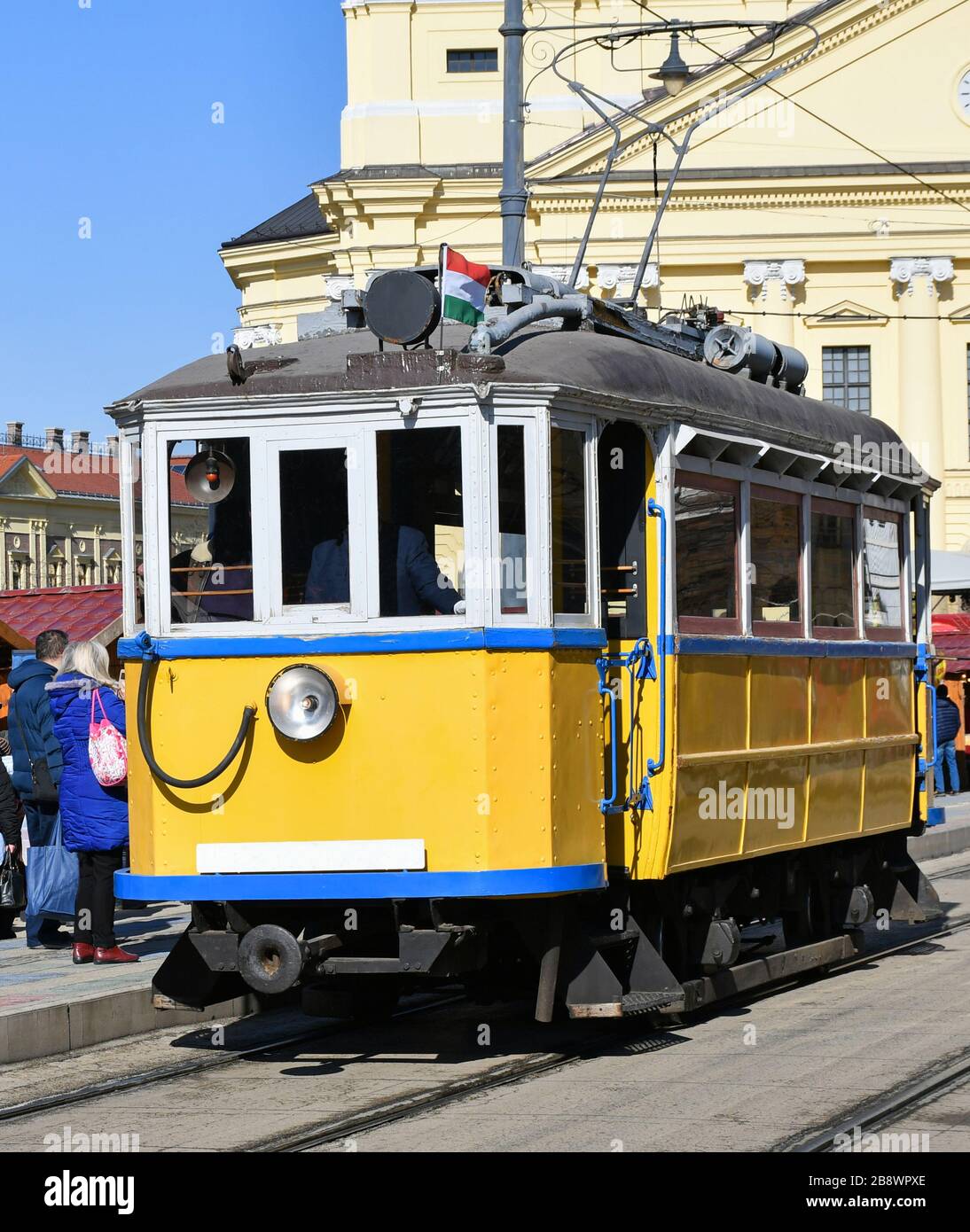 Old yellow tram on the street Stock Photo - Alamy