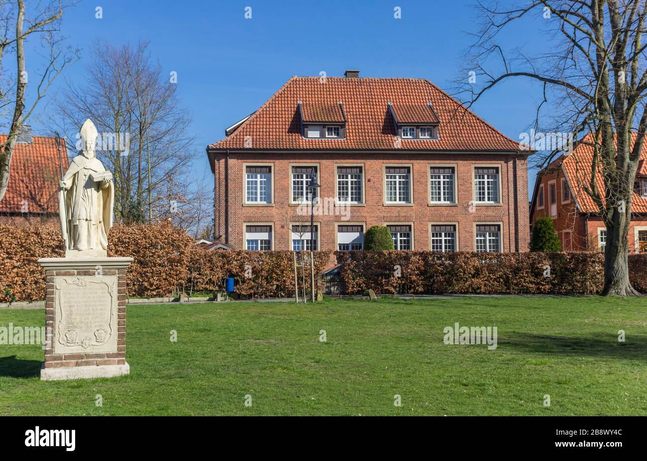 Statue of Boniface in the historic center of Freckenhorst, Germany ...