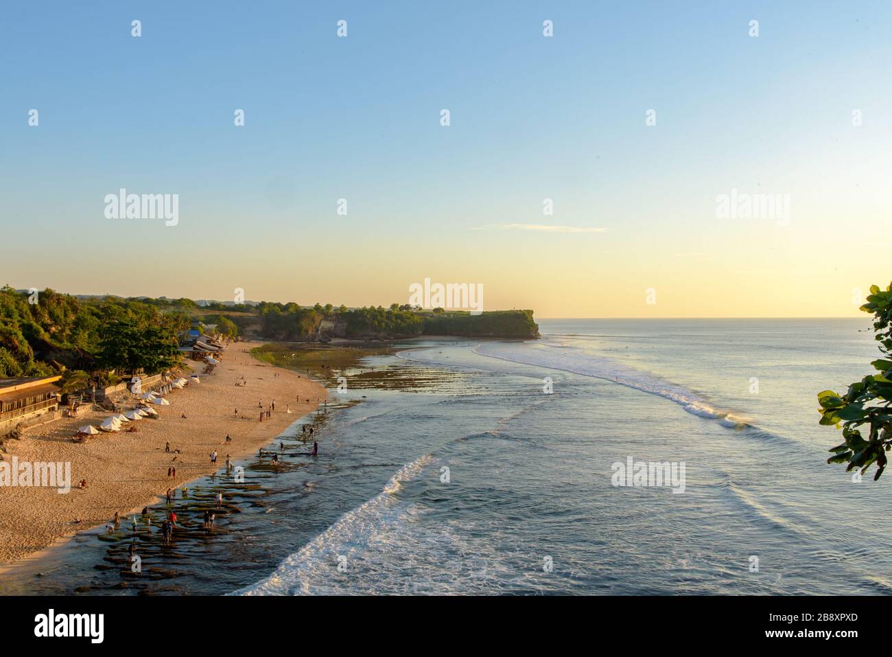 Magical sunset at Balangan beach, Bali in Indonesia Stock Photo - Alamy