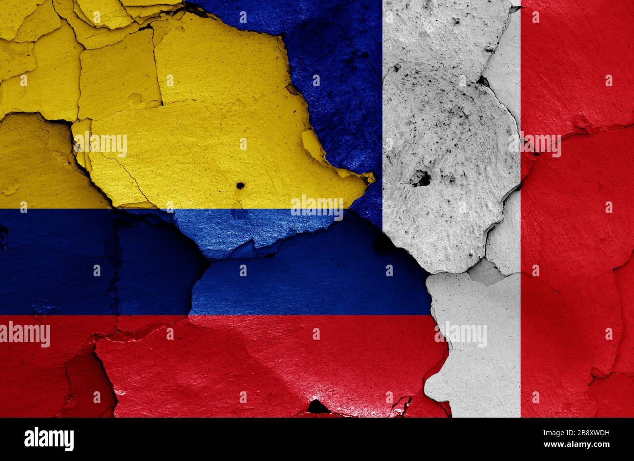 flags of Colombia and France painted on cracked wall Stock Photo - Alamy