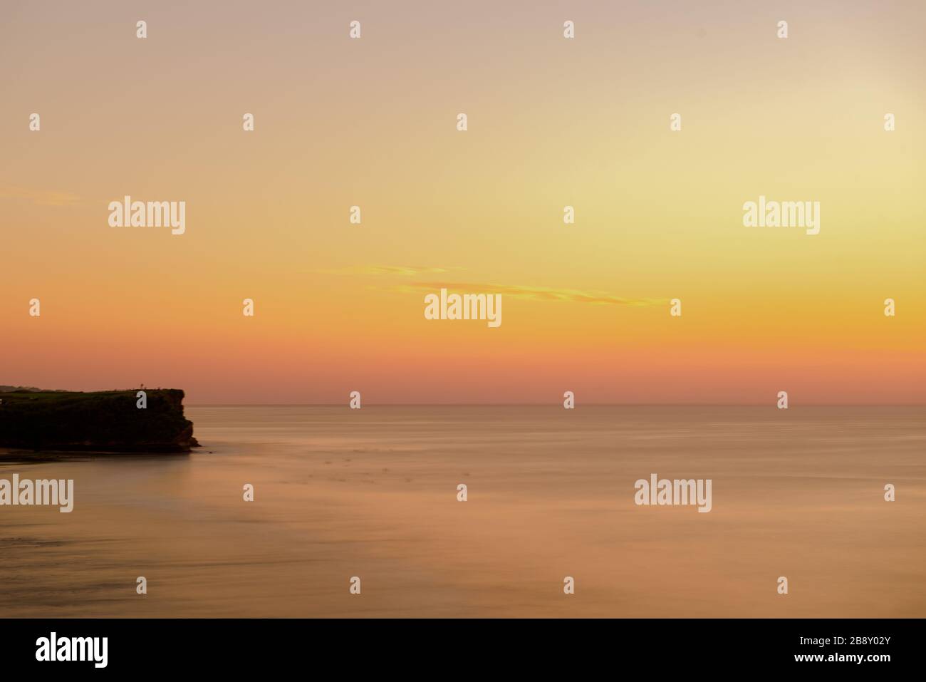 Magical sunset at Balangan beach, Bali in Indonesia Stock Photo - Alamy