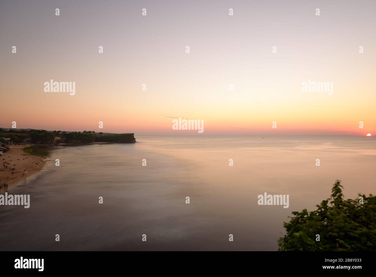 Magical sunset at Balangan beach, Bali in Indonesia Stock Photo - Alamy