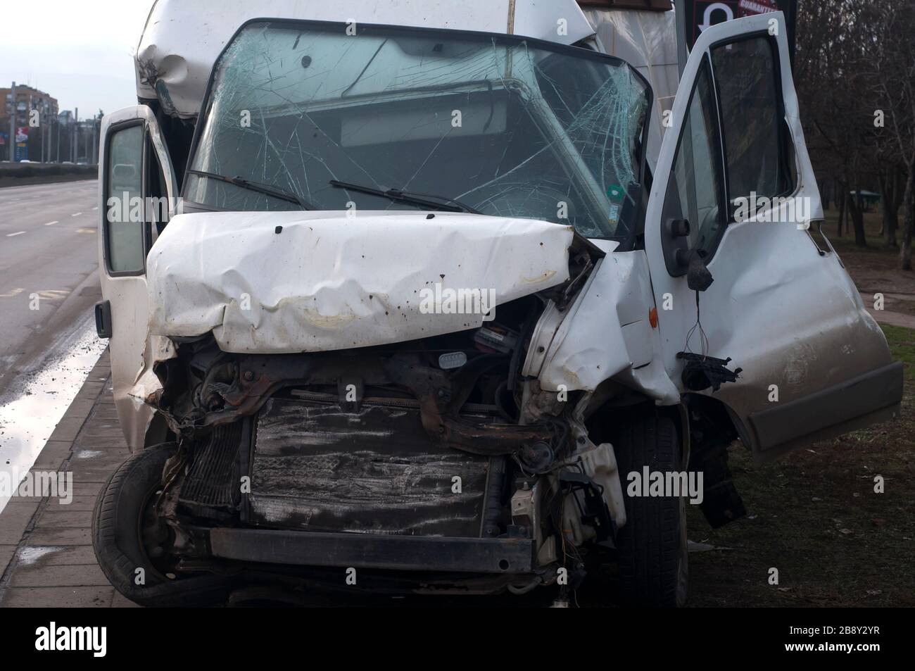 Crushed in car accident transport van Stock Photo - Alamy
