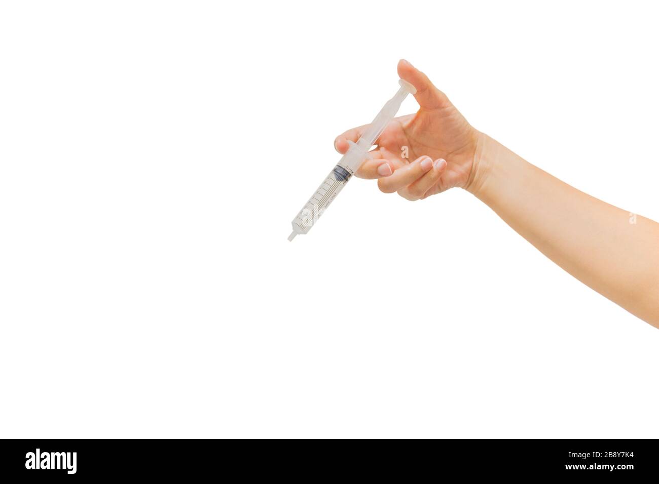 Hand holding syringe isolated on white background Stock Photo - Alamy