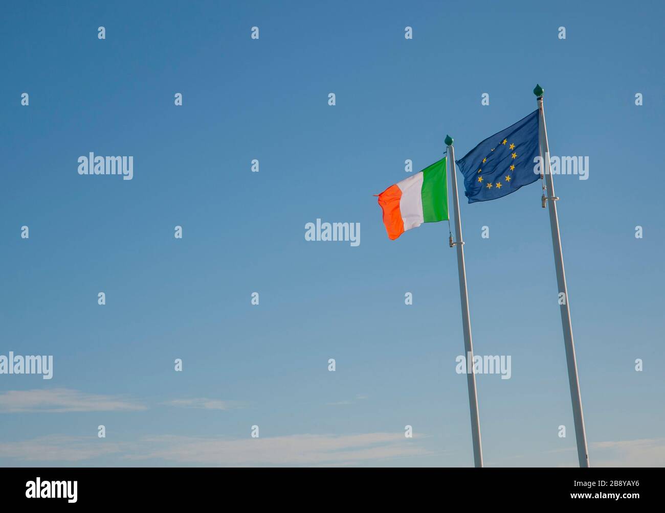 Irish and European Union flags flying together Stock Photo - Alamy