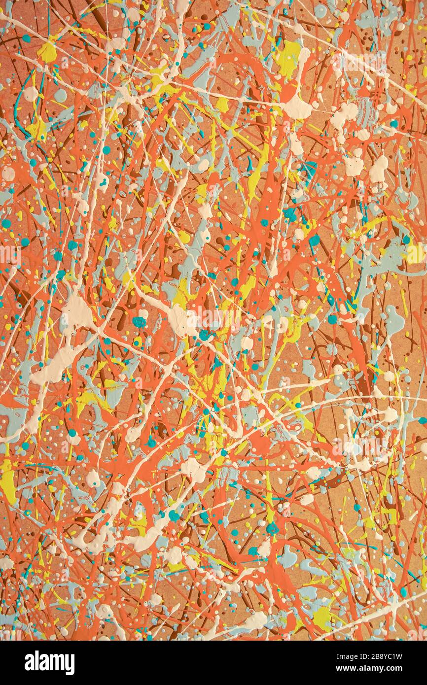 different colored spots on a yellow background created by irregular ...