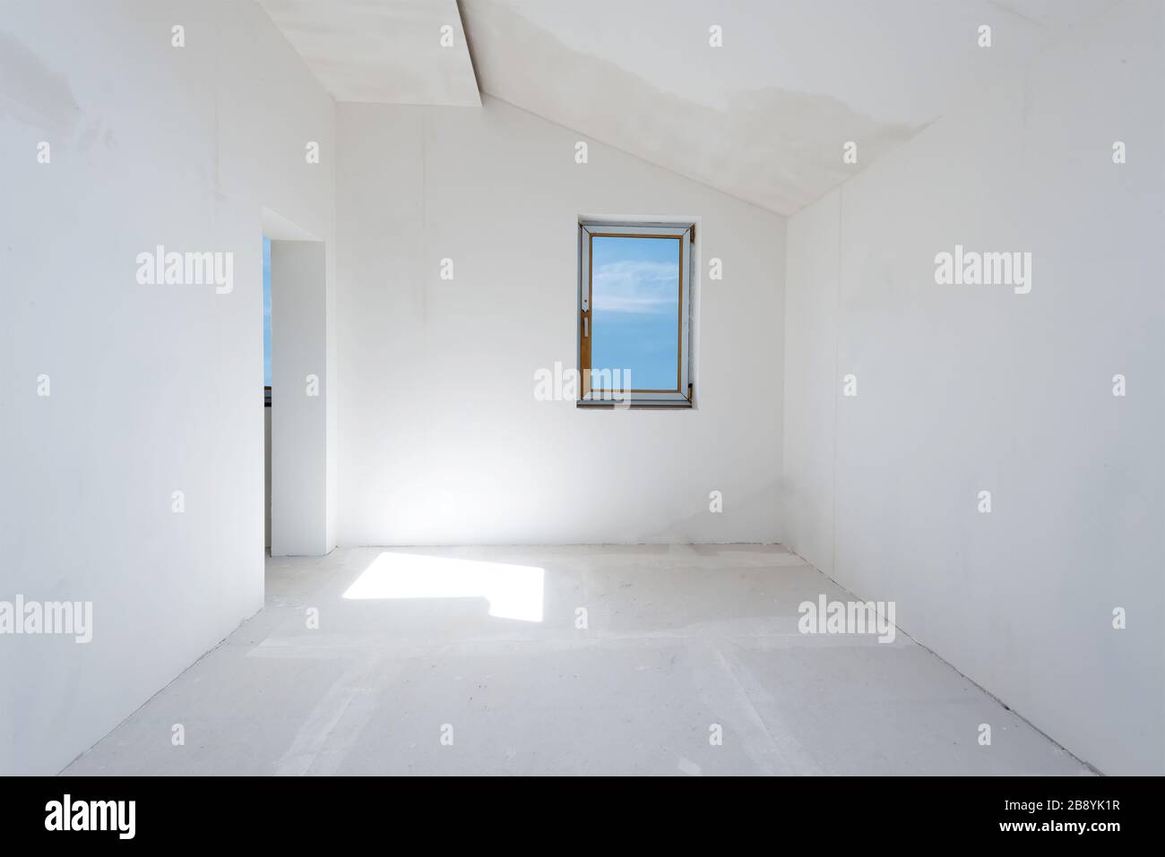 Unfinished building interior, white room with sky view (includes ...