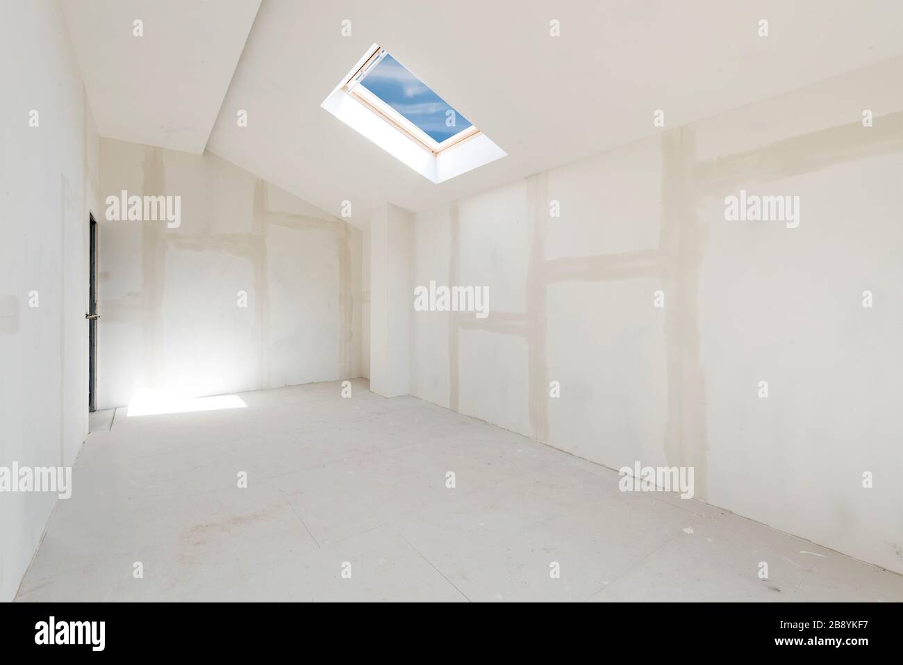 Unfinished building interior, white room with sky view (includes ...