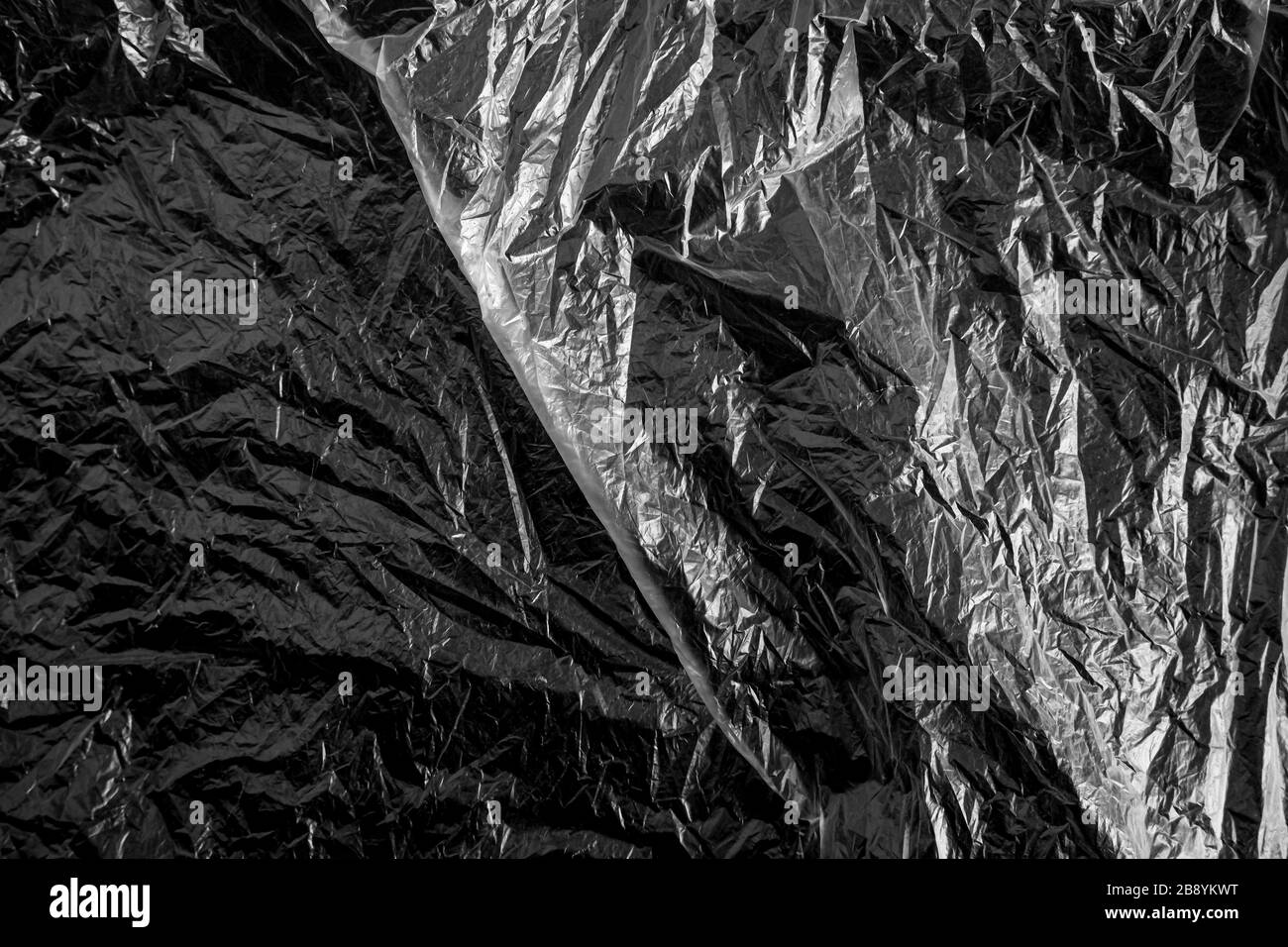 Roll plastic packaging film Black and White Stock Photos & Images - Alamy