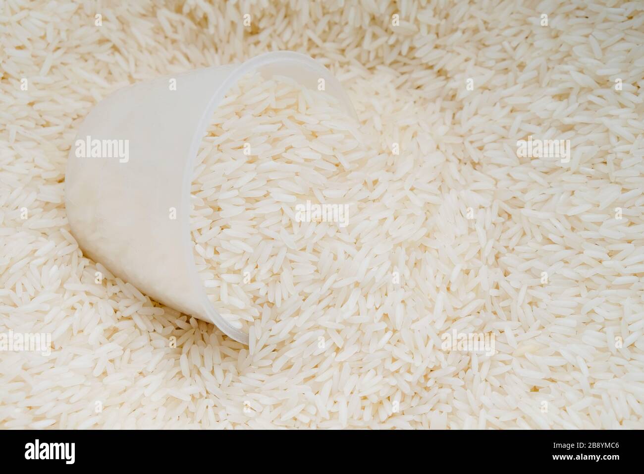 White long rice background texture Stock Photo - Alamy