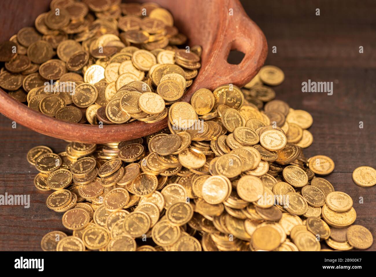 Coin cascade hi-res stock photography and images - Alamy