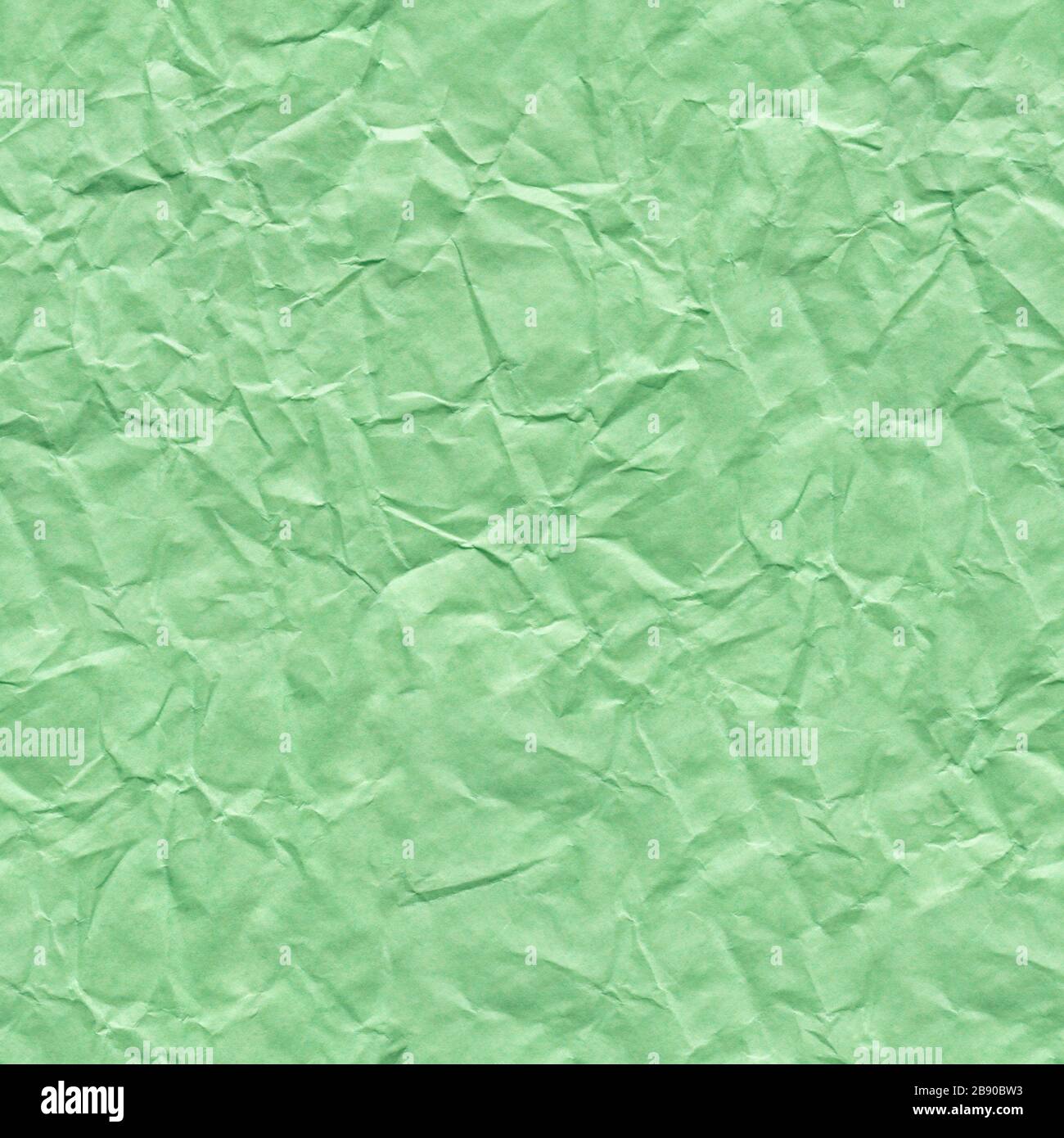 Crumpled paper texture in superior green color for your lovely greeting ...